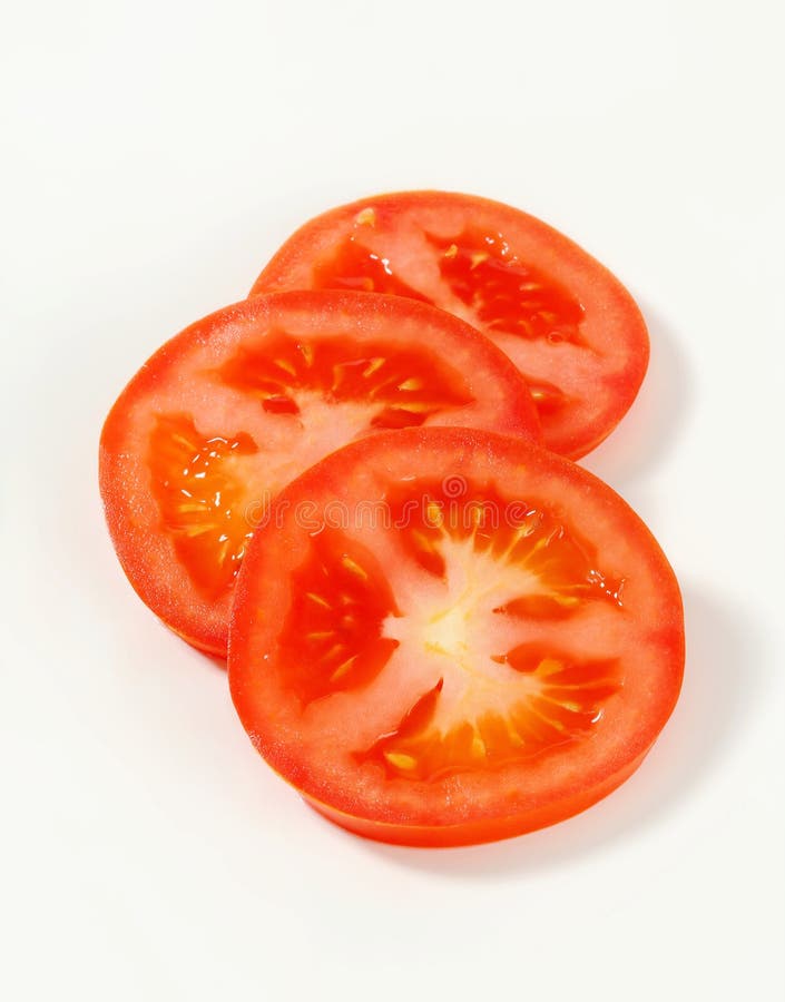 Neue Tomatenscheiben stockfoto. Bild von oberseite, organisch - 34498346