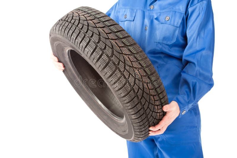 Neuer Autoreifen im Studio stockbild. Bild von arbeit - 22965061
