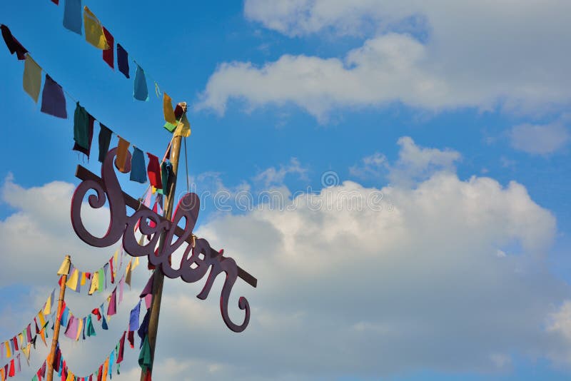 Neutral Colored Fluttering Flags, Word Saloon Stock Photo - Image of ...