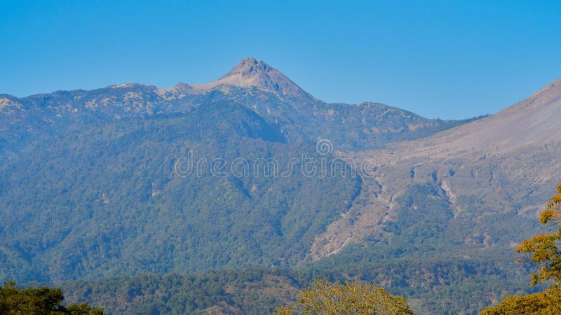 Nevado De Colima and Colima Volcano Together in a Clear Sky Stock Image ...