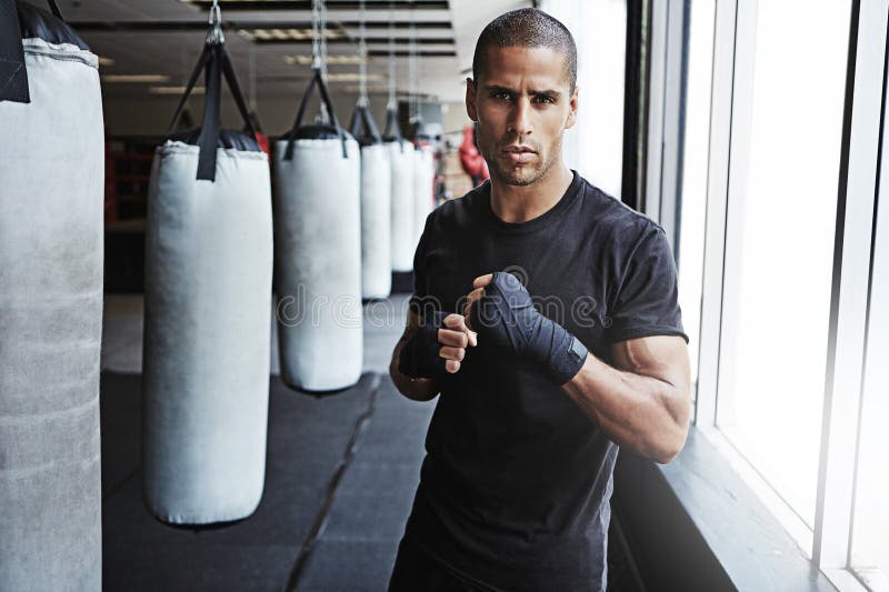 Never Forget What Youre Fighting for. a Kick-boxer Training in a Gym ...