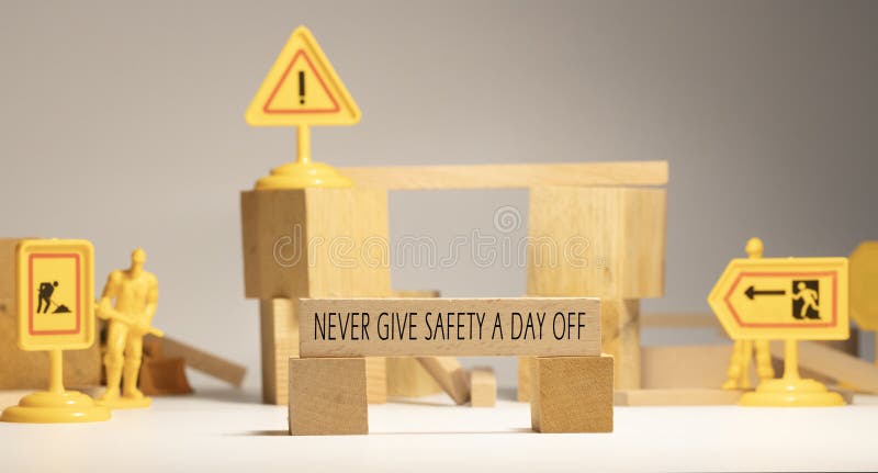 Never Give Safety a Day Off. Written on Wooden Surface Stock Photo ...