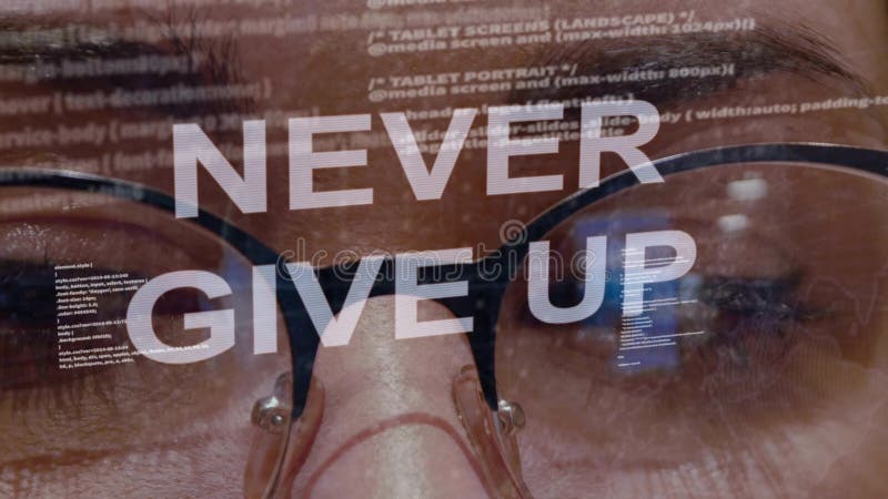 Never Give Up Text on Background of Female Developer Stock Video ...