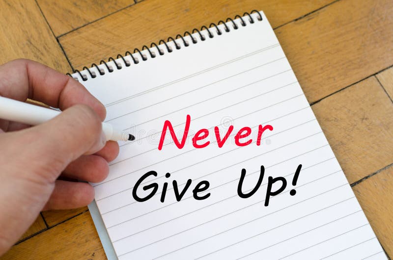 Never Give Up Text Concept on Notebook Stock Image - Image of concept ...