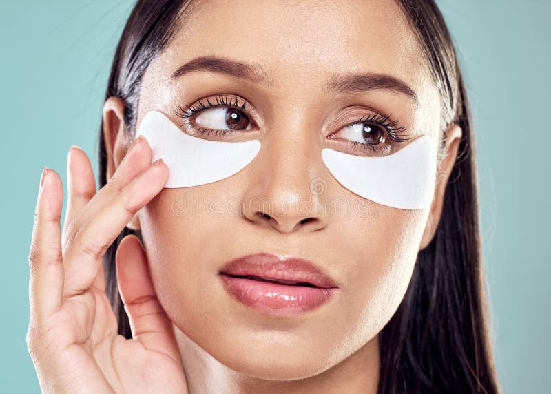 Never Looking Back only Forward. Shot of a Young Woman Using Eye Masks ...