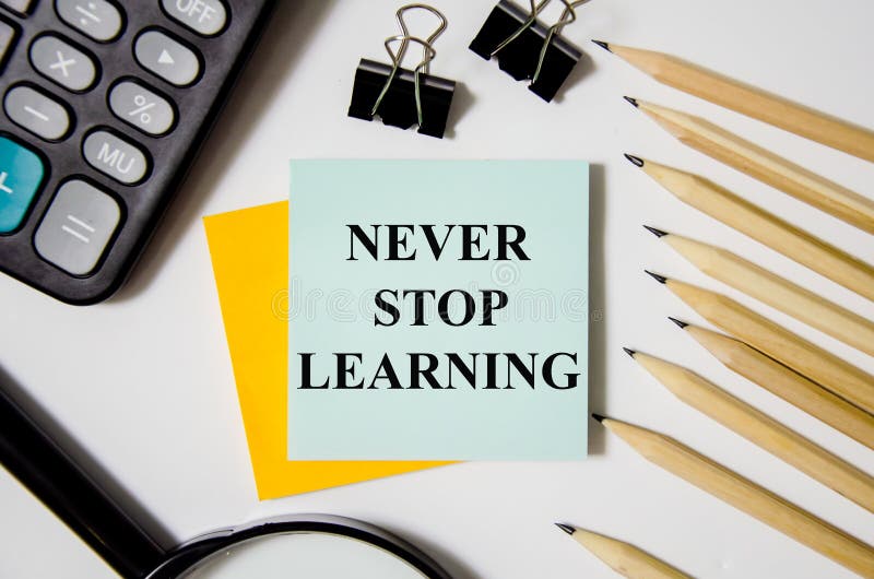 Never Stop Learning Text is Written on Yellow Sticker and White ...