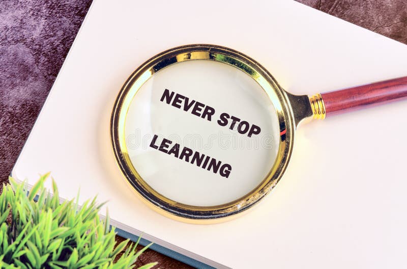 Never Stop Learning Written through a Magnifying Glass in a Business ...