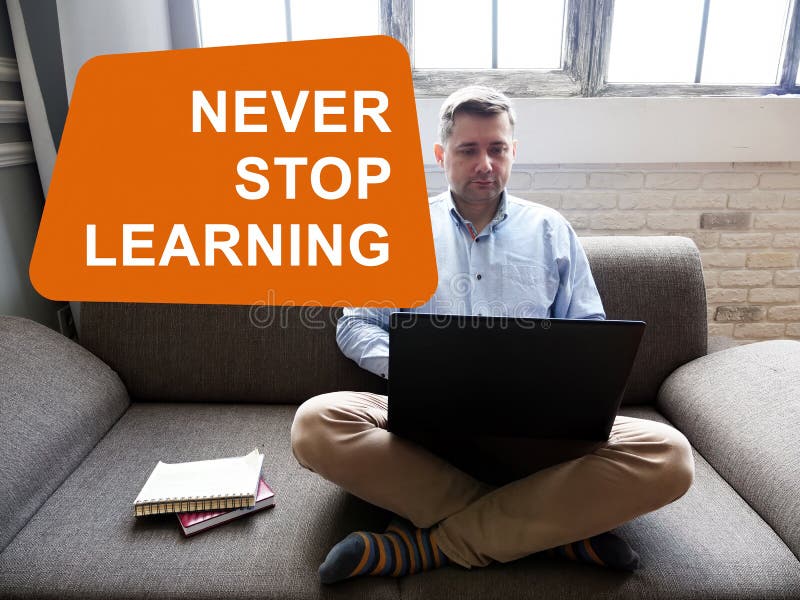 Never Stop Learning. the Young Man Studies at Home. Stock Image - Image ...