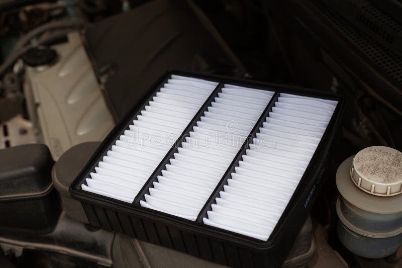 New Air Filter. Replacement Engine Air Flow Filter Stock Photo - Image ...
