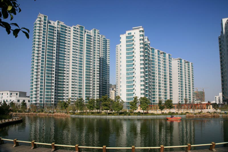 New Apartment Buildings in China Stock Photo - Image of waterway ...