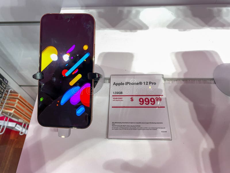 The New Apple IPhone 12 and 12 Pro on Display at the T Mobile Store ...