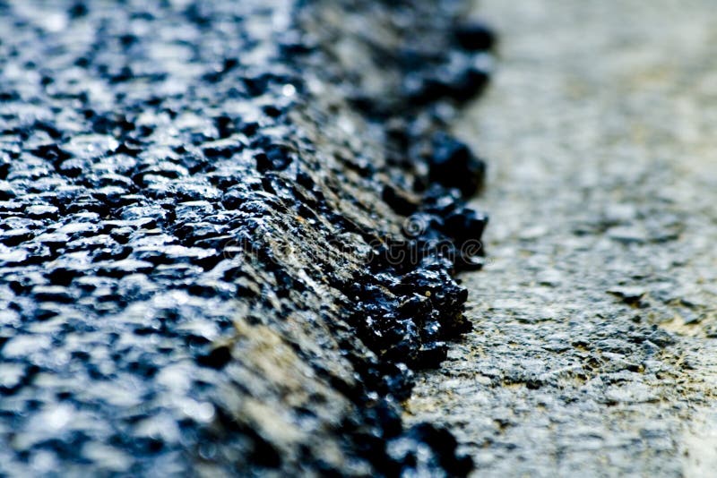 Bitumen On The Asphalt Road, Which Melts Due To The Heat In The Summer ...