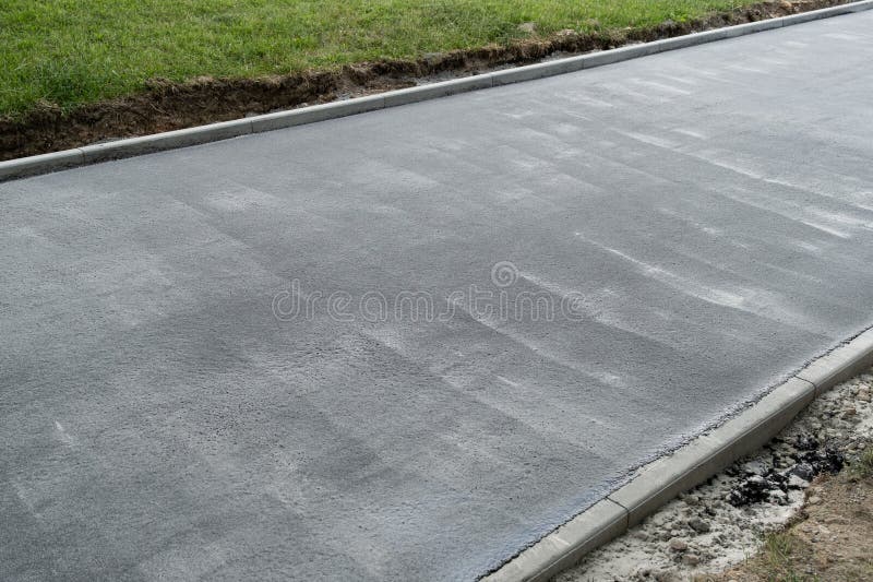 New Asphalt on the Walkway. Road Construction Site Stock Image - Image ...