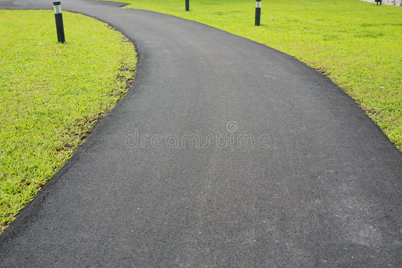 New Asphalt Which is a Smooth Road Walkway in the Green Grass Garden ...