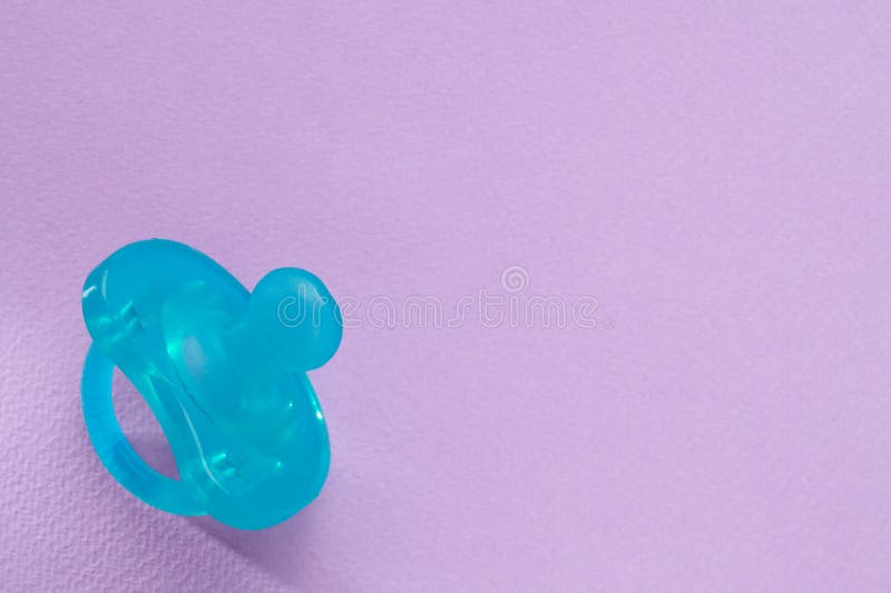 New Baby Pacifier on Purple Background, Top View. Space for Text Stock ...