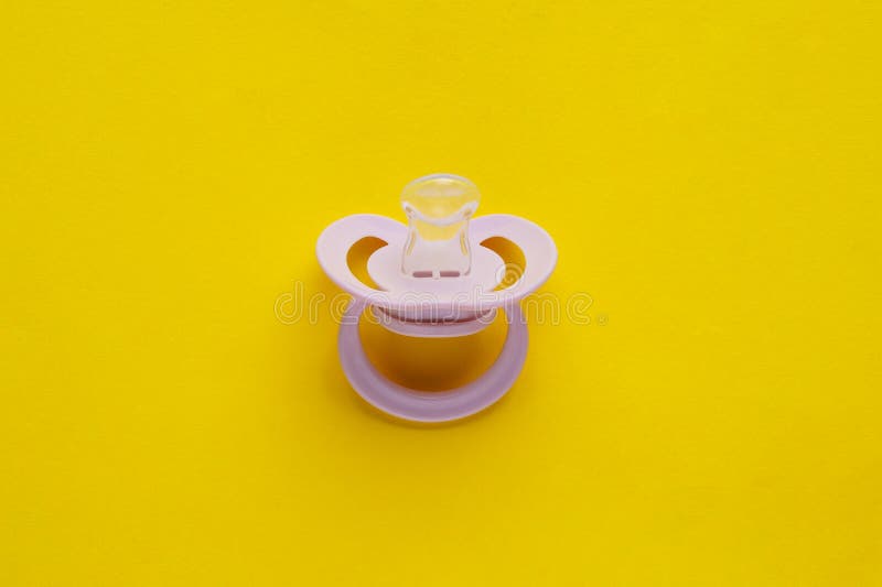 New Baby Pacifier on Yellow Background, Top View Stock Image - Image of ...