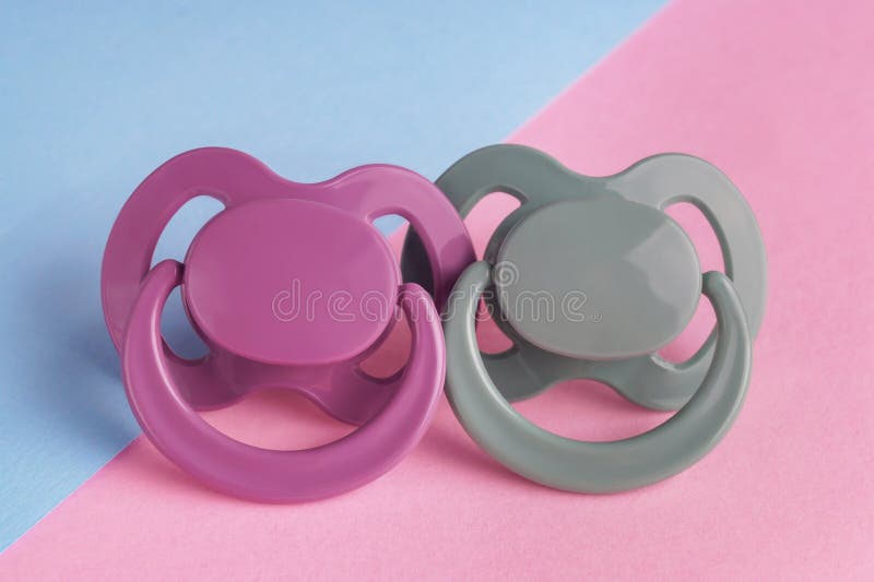 New Baby Pacifiers on Color Background, Closeup Stock Image - Image of ...