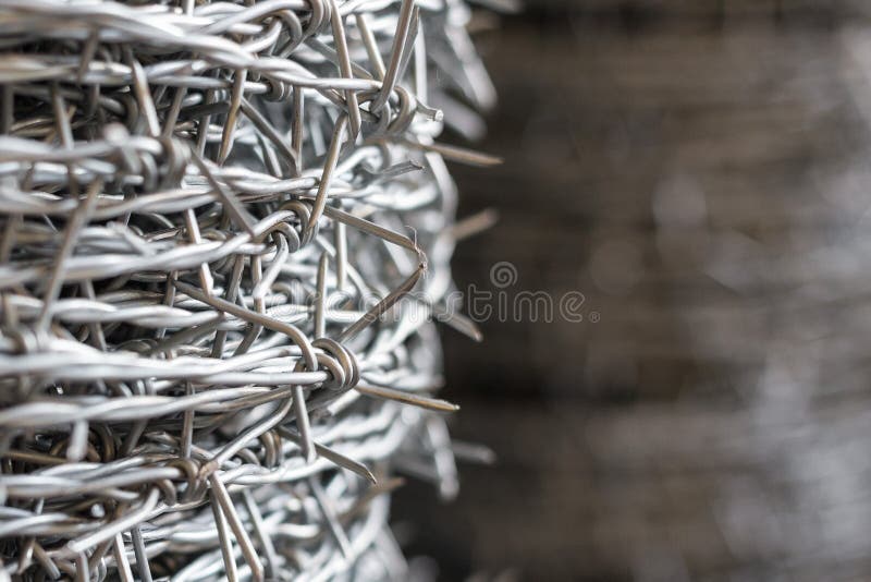 New Barbed wire stock photo. Image of coil, detail, business - 147784742