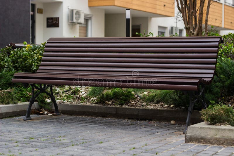 New Bench in the Courtyard of the Building Stock Image - Image of ...