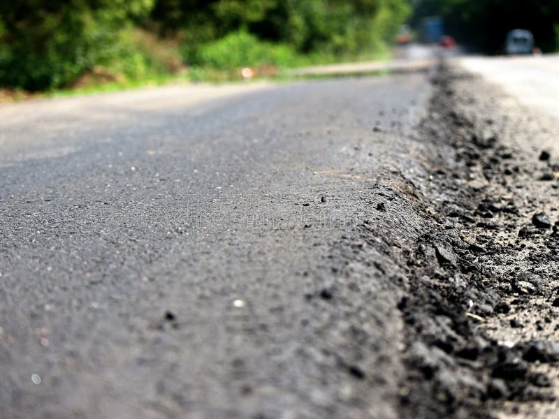 New Bitumen Asphalt: Paving and Repair Work on Roads Stock Image ...
