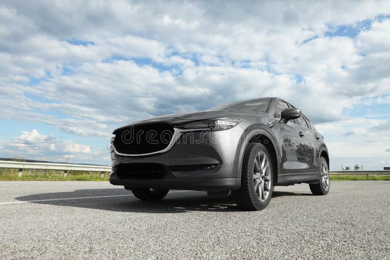 New Black Modern Car on Asphalt Road Stock Photo - Image of auto, drive ...