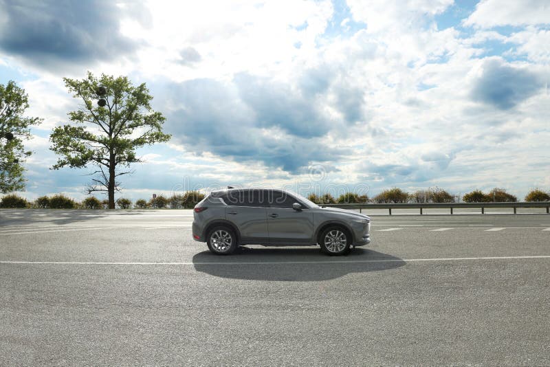 New Black Modern Car on Asphalt Road Stock Image - Image of metal ...