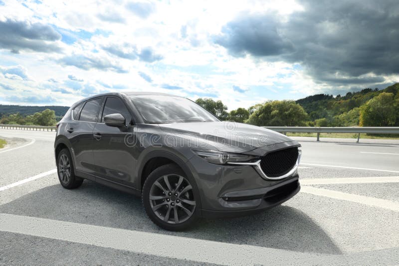 New Black Modern Car on Asphalt Road Stock Photo - Image of parked ...