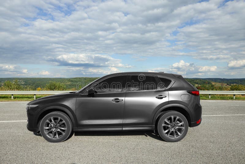 New Black Modern Car on Asphalt Road Stock Image - Image of shiny ...