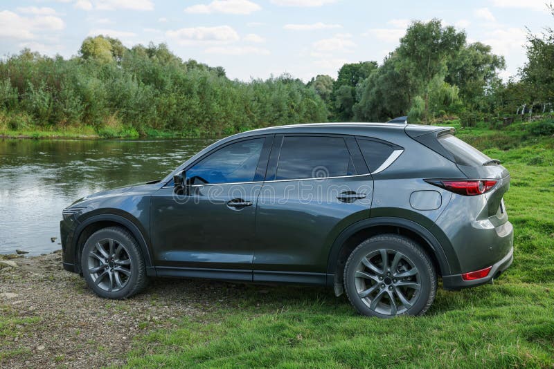 New Black Modern Car on Ground Near River Stock Photo - Image of design ...