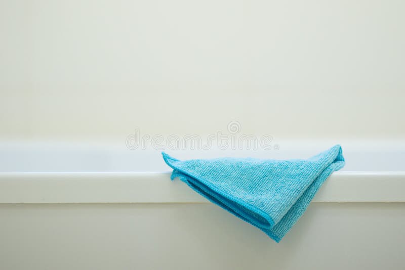 A New Blue Cleaning Cloth Lies on the Bathroom Stock Photo - Image of ...