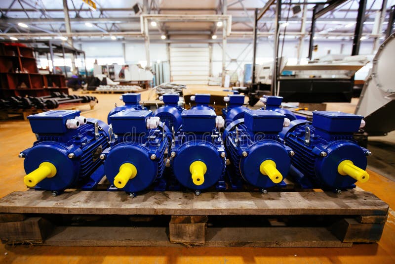 New Blue Electric Motors in the Factory for the Assembling of Machines ...