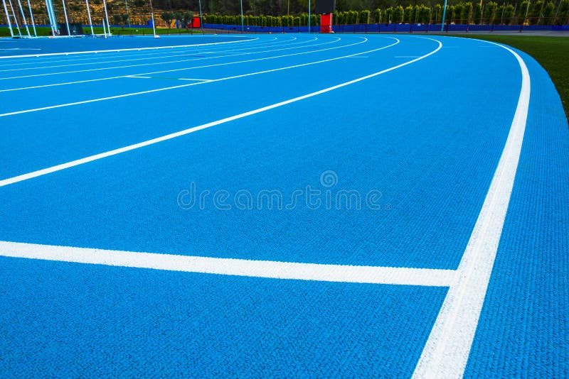 Blue Running Treadmill Track with Lane Numbers in Stadium Outdoors ...