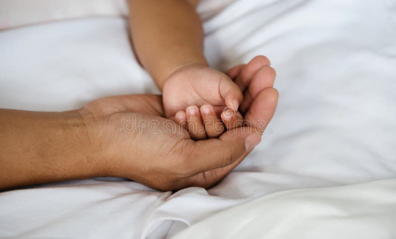 New born baby hand. stock image. Image of cozy, concepts - 260693205