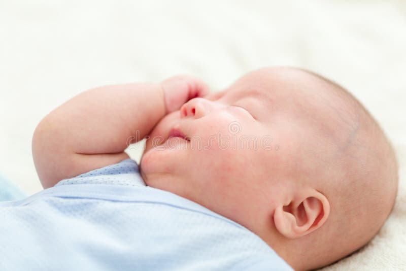 New Born Baby Hand Touch Face Stock Photo - Image of innocent, adorable ...