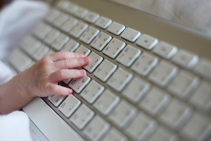 Baby hand with keyboard stock image. Image of computer - 3397559