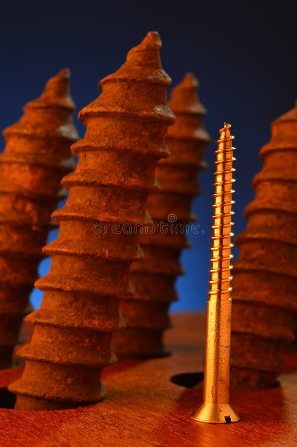 New Brass Paired with Rusty, Corroded Screws Stock Image - Image of ...
