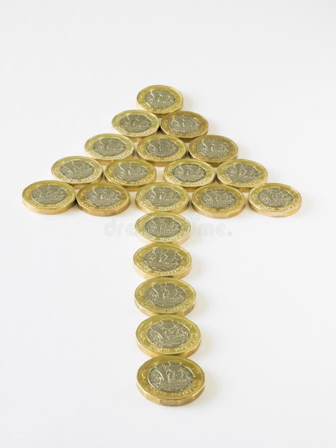 New British Pound Coins Arranged To Make an Arrowhead Shape Editorial ...