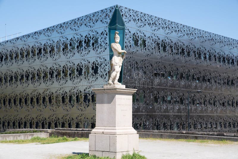 New Building Built on a Modern Architecture with an Old Statue in Front ...