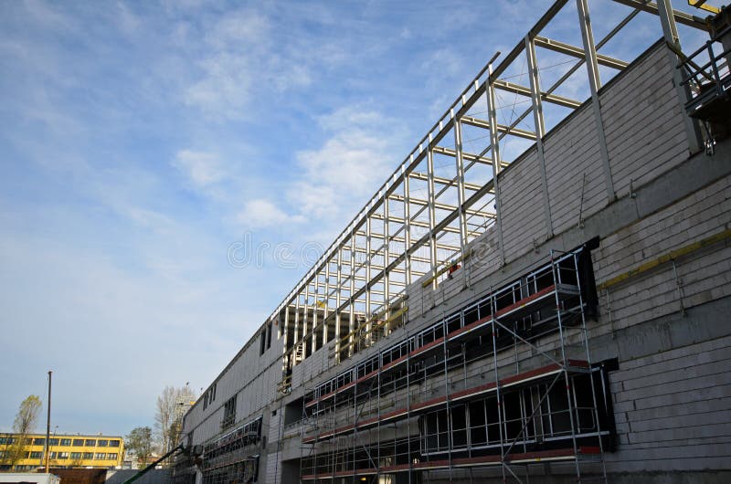 New Building during Construction Stock Image - Image of wall, head ...