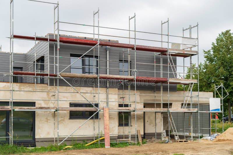 A New Building with Scaffolding Stock Photo - Image of savings ...