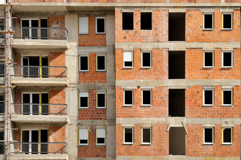Stack of Red Building Blocks on Messy Site Stock Image - Image of ...