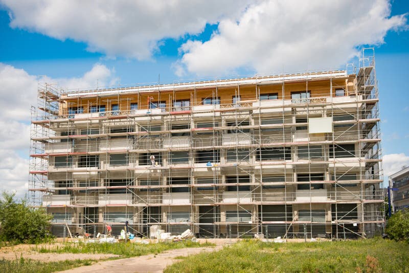 New Building Under Construction - Building Site, Facade and Scaffolding ...