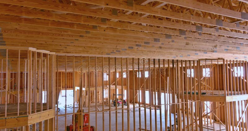 The Construction of a Stick House Involves Assembling Timber Beams into ...