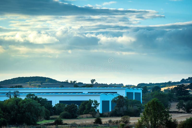 New Built Distribution Warehouse Building with Farm Fields in ...
