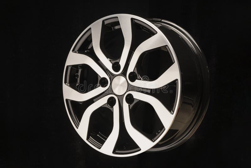 New Car Alloy Wheel, Close-up on a Black Background Stock Photo - Image ...