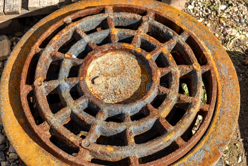 New Cast Iron Manholes Prepared for Installation at the Construction ...