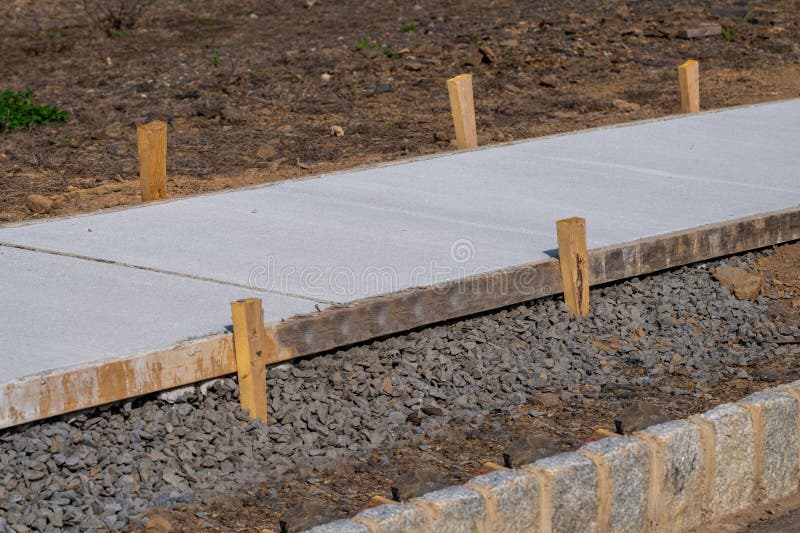 New cement sidewalk stock photo. Image of path, roadworks - 308621450