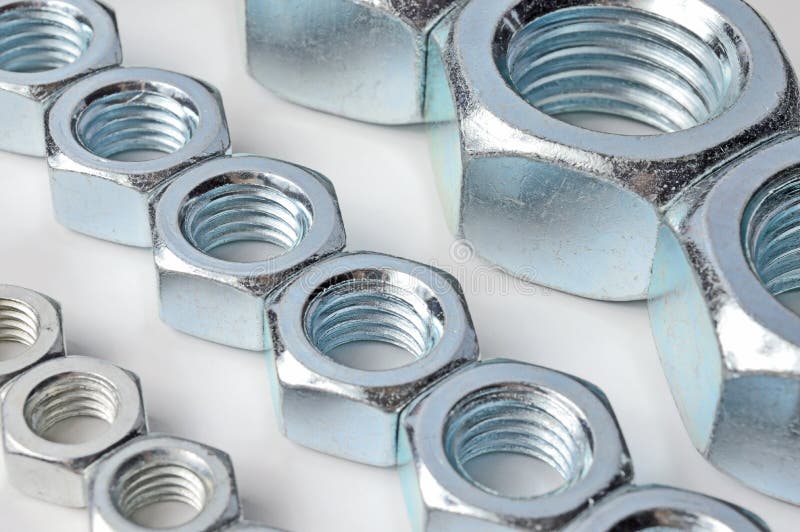 Chrome nuts and bolts stock image. Image of industry - 18747053