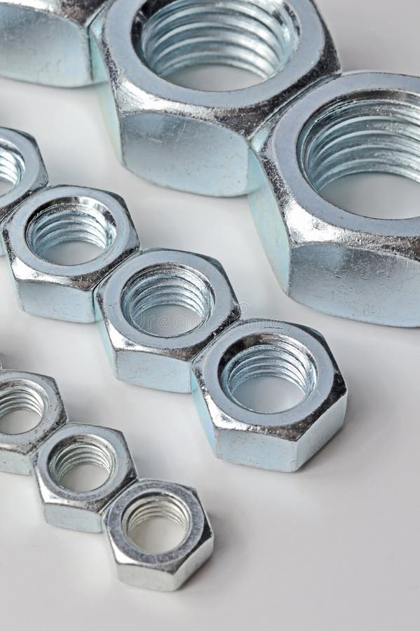 Chrome nuts and bolts stock image. Image of industry - 18747053