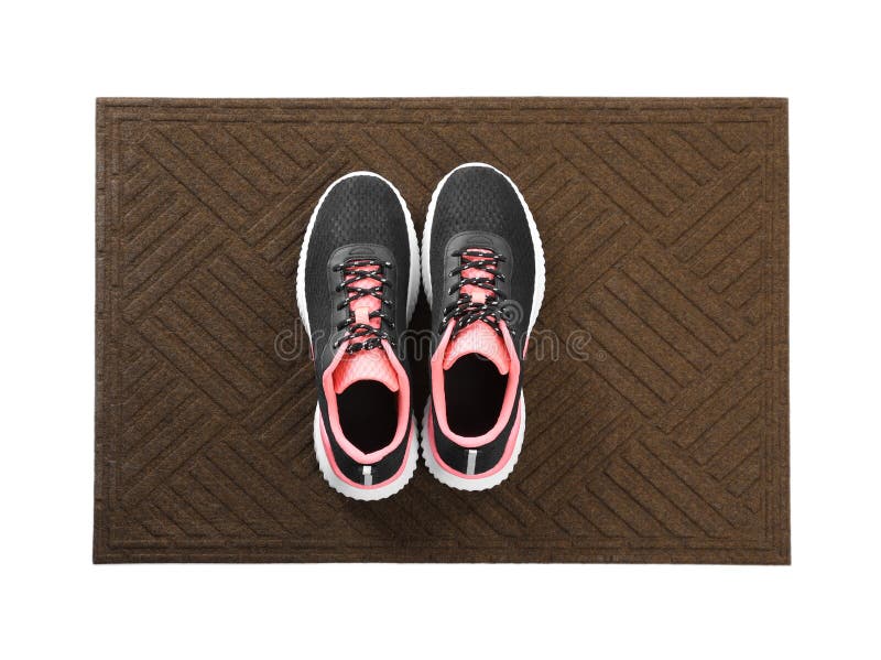 New Clean Door Mat with Shoes on White Background, Top View Stock Image ...